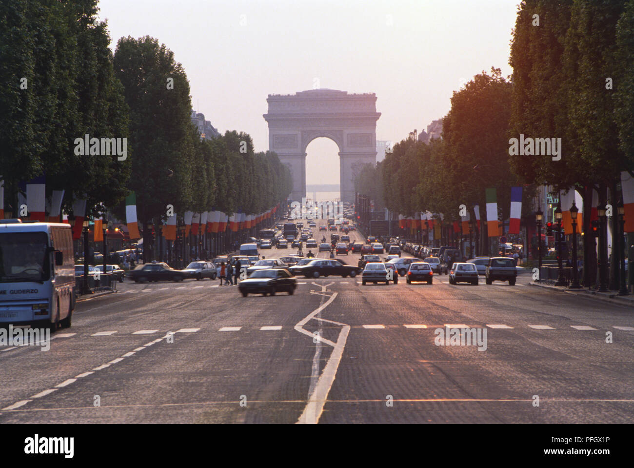 France, Paris, Arc de Triomphe with cars driving down Champs Elysees ...