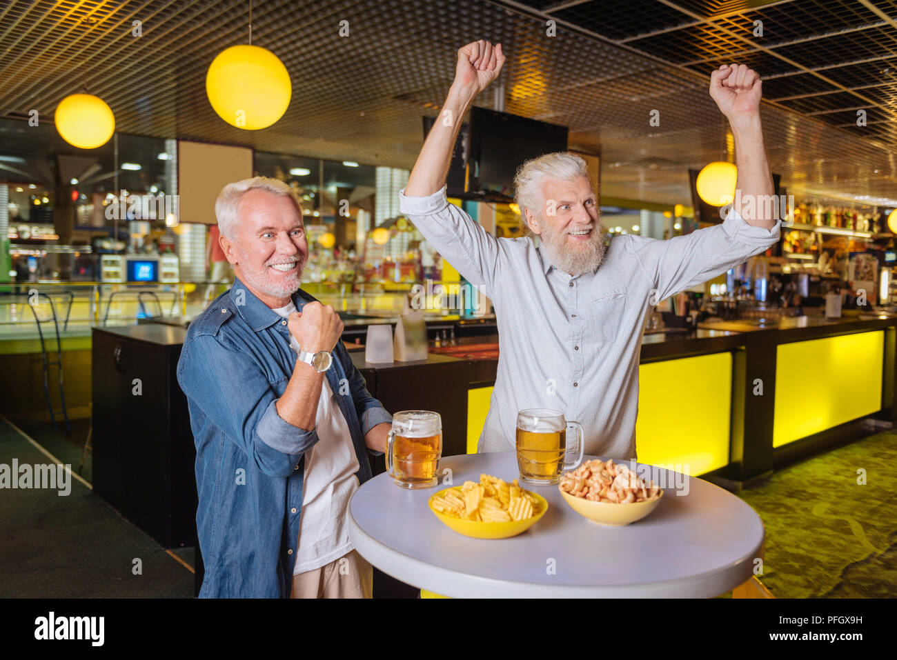Happy joyful aged men feeling happy together Stock Photo - Alamy