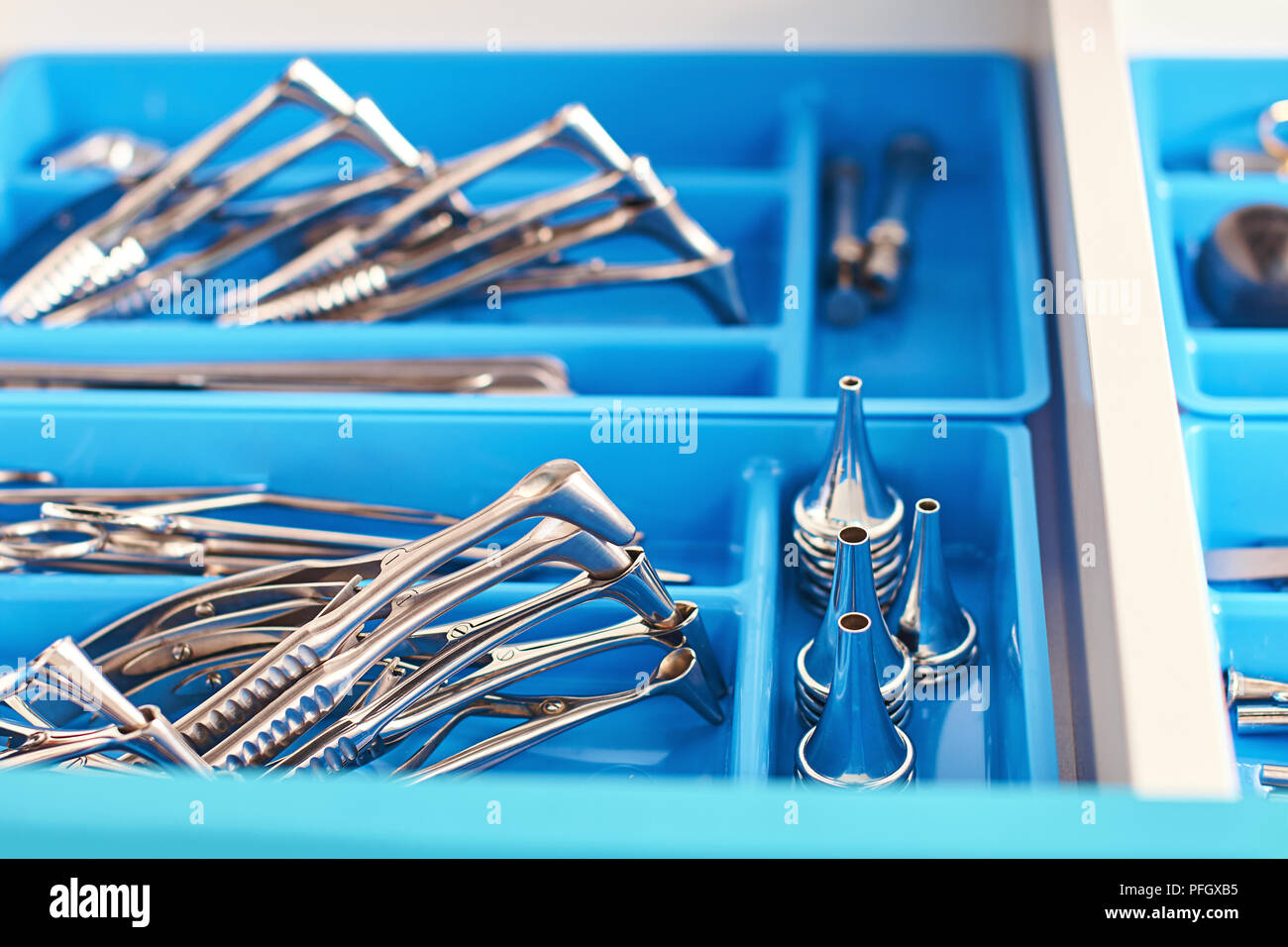 Otorhinolaryngology or ENT surgery instruments in a blue medical box ...
