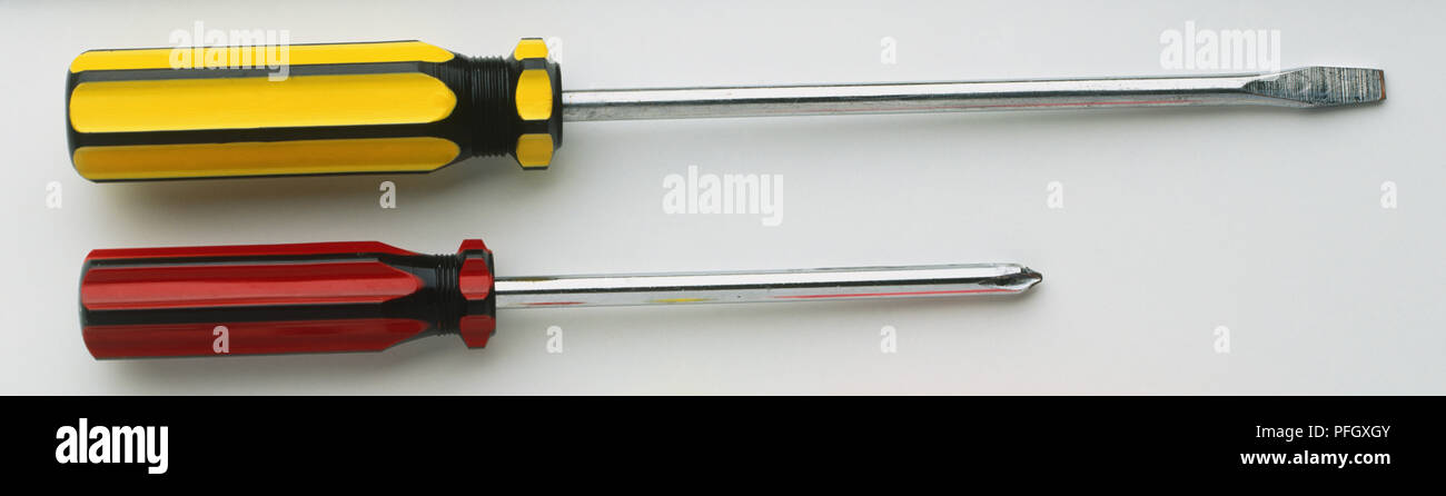 Two screwdrivers, a philips and a plain Stock Photo - Alamy
