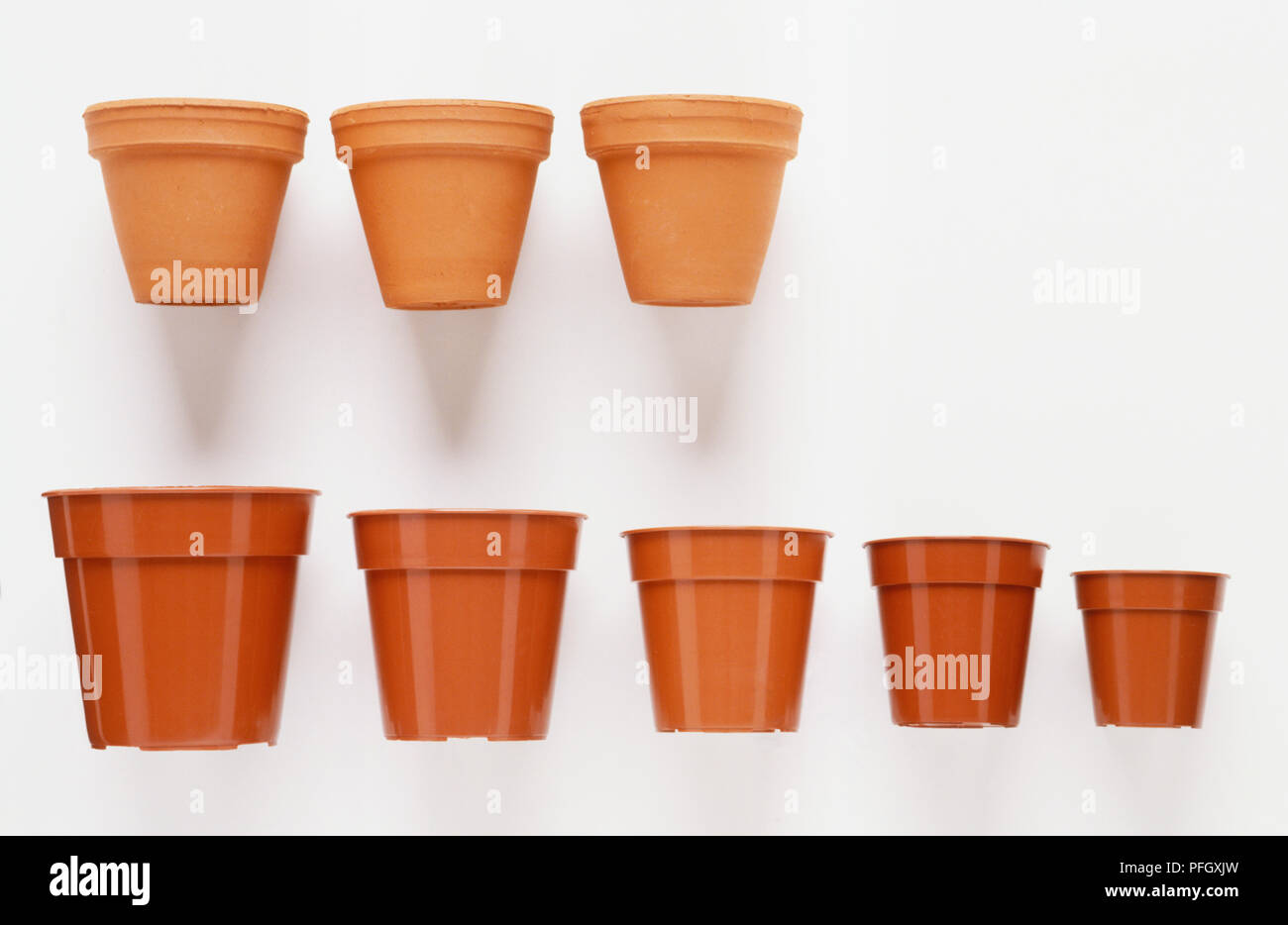 Three terracotta plant pots Stock Photo - Alamy