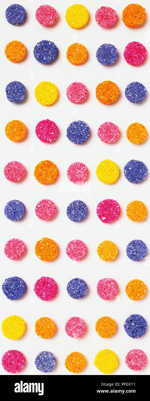 Fifty differant coloured sweets in five rows of ten. Blue, pink, yellow ...