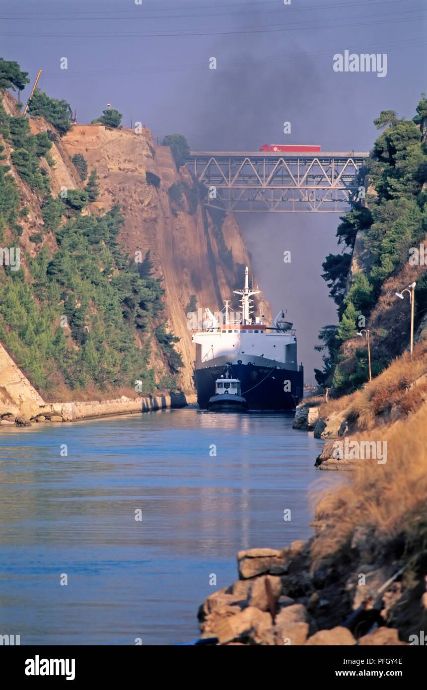 Greece, Peloponnese, ship passing through the Corinth Canal, train on ...