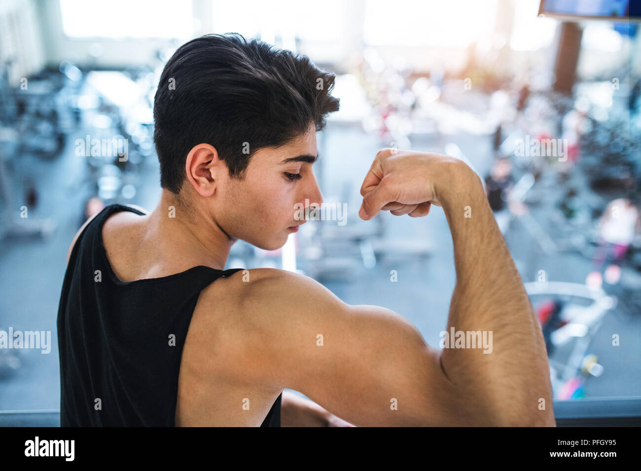 Boys showing of muscles hi-res stock photography and images - Alamy