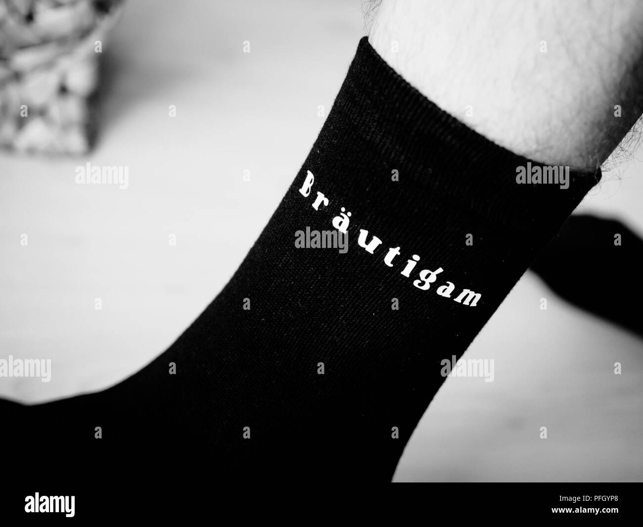 The legs of the stylish groom, cool sock with inscription groom Stock ...