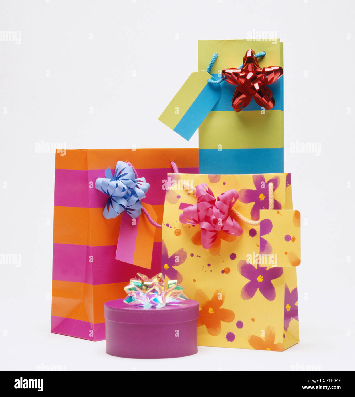 Four wrapped presents Stock Photo - Alamy
