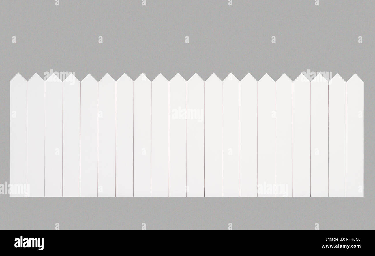 Piece of white picket fencing Stock Photo - Alamy