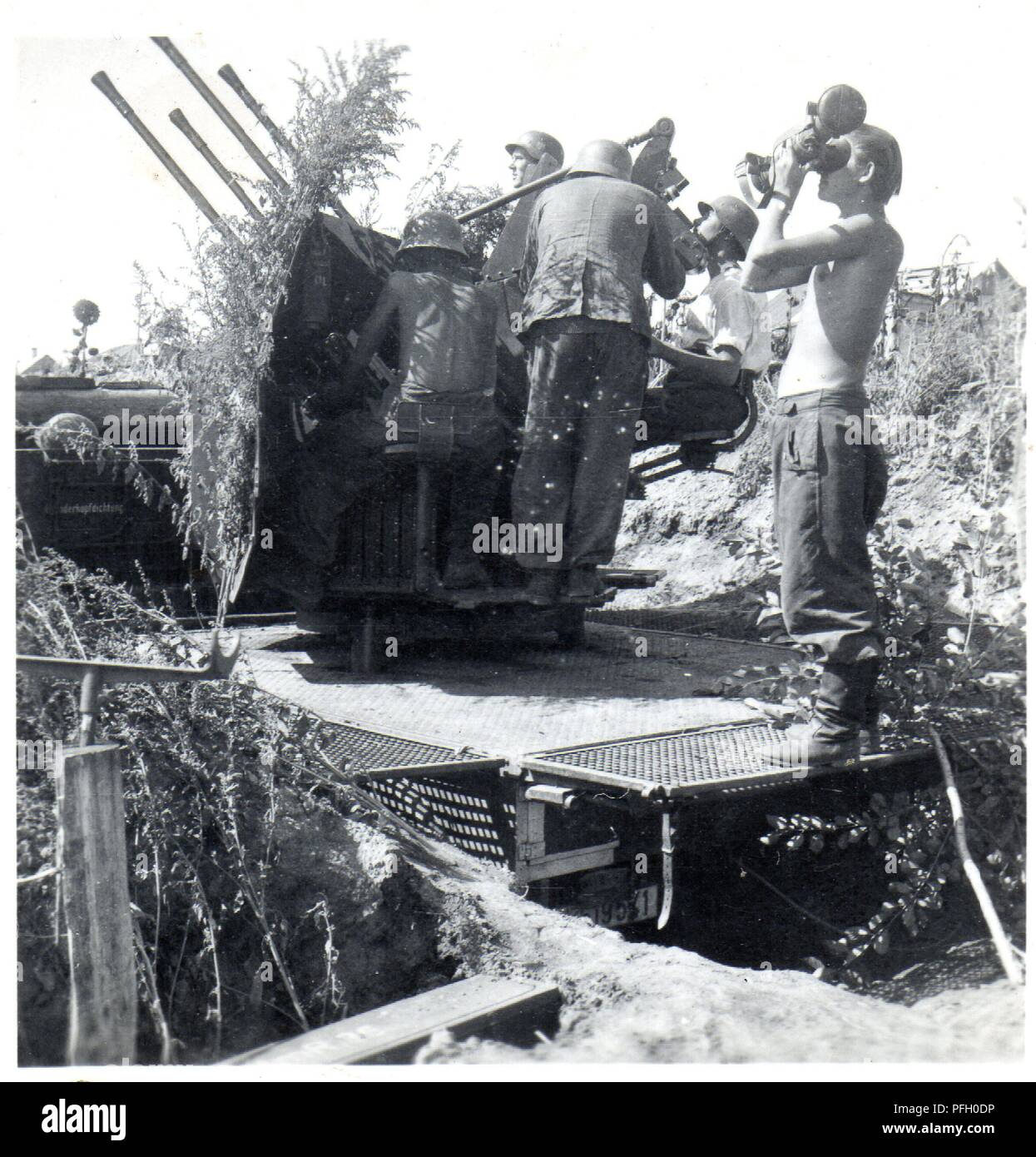 German Soldiers Fire Four Barrel Anti Aircraft Gun Flakvierling on the ...
