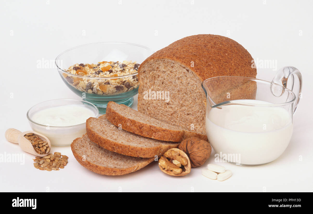 Selection of foods rich in magnesium, including a jug of milk ...