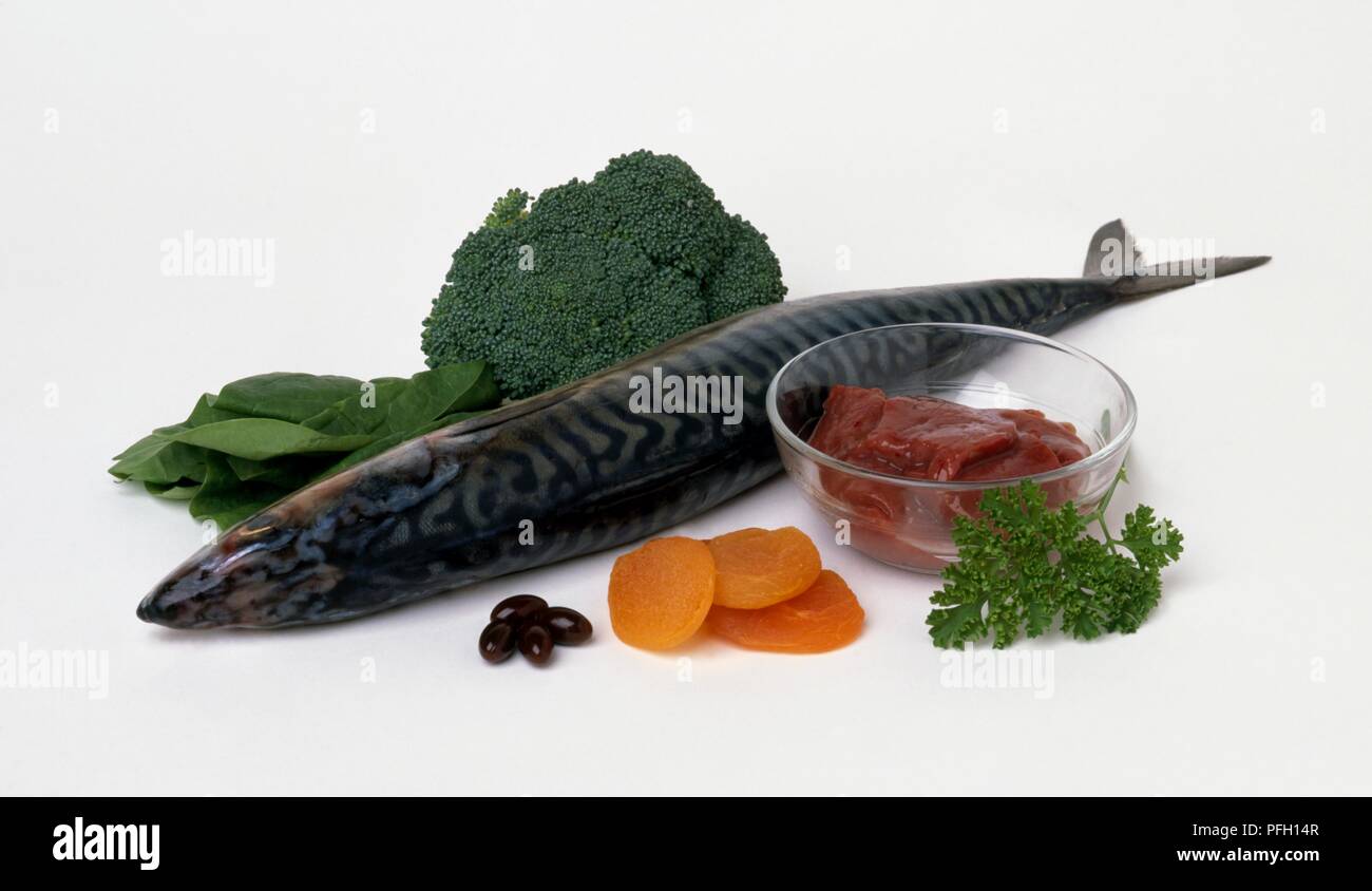 Sources of iron including spinach, broccoli, parsley, oily fish such as ...