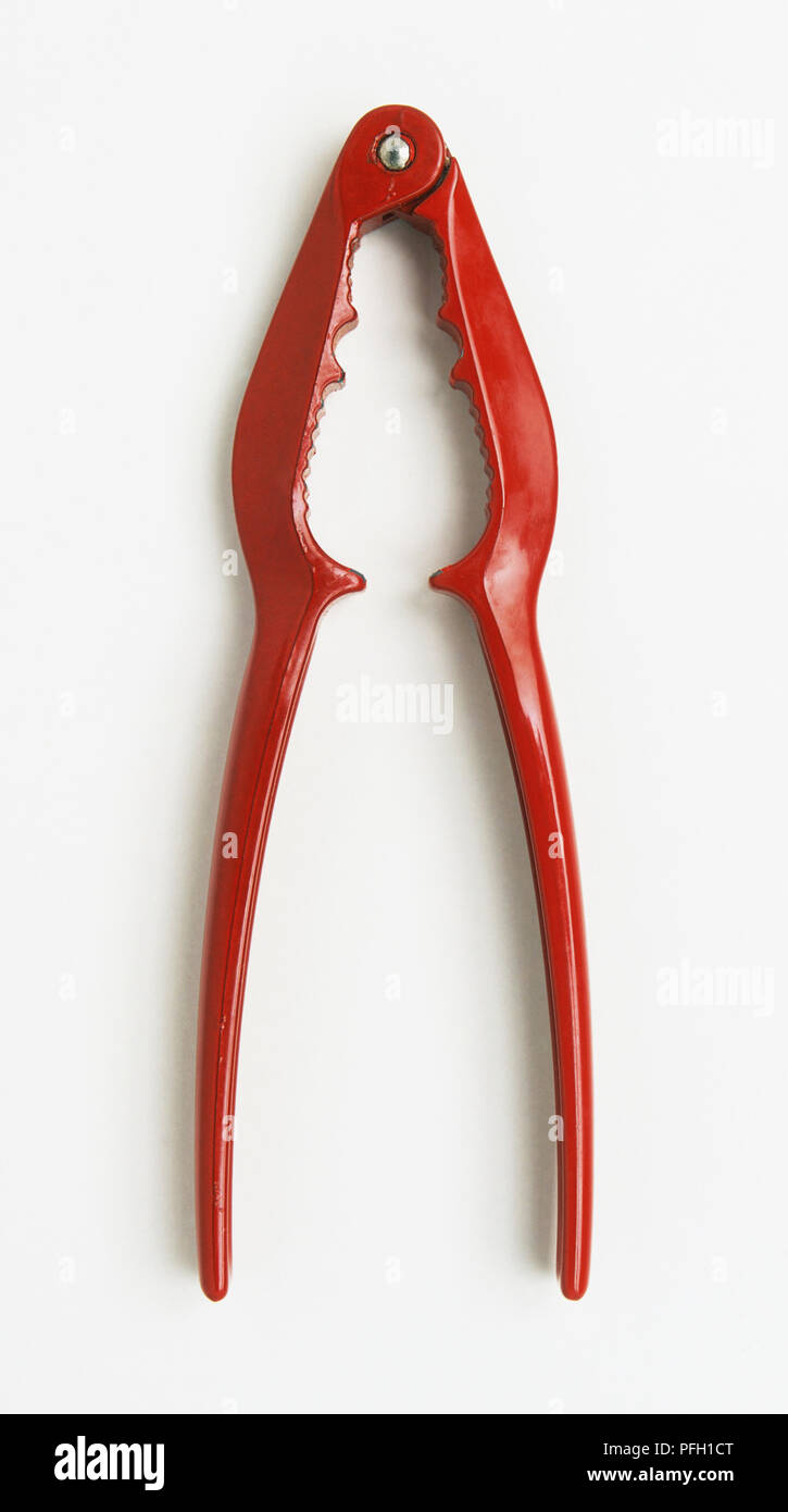 Red metal nutcracker Stock Photo - Alamy