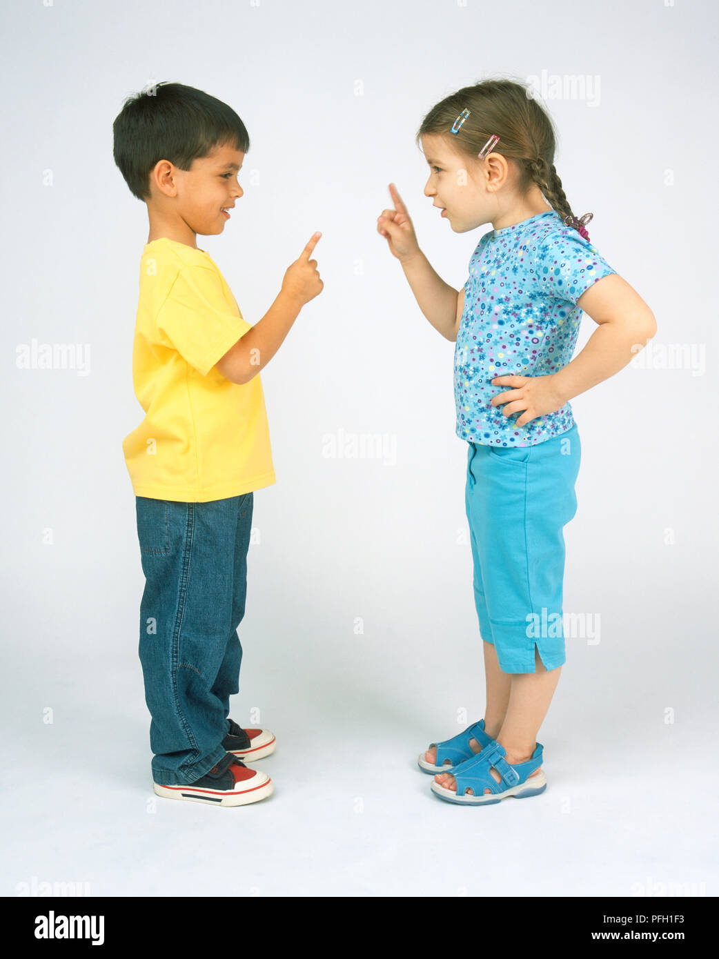 Girl facing boy hi-res stock photography and images - Alamy