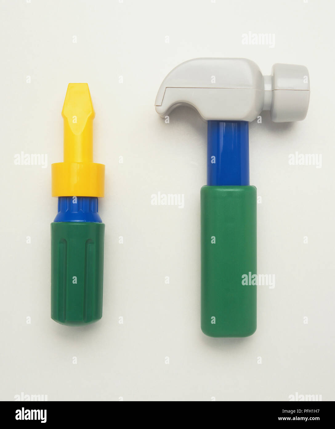 Toy screwdriver and toy hammer Stock Photo - Alamy