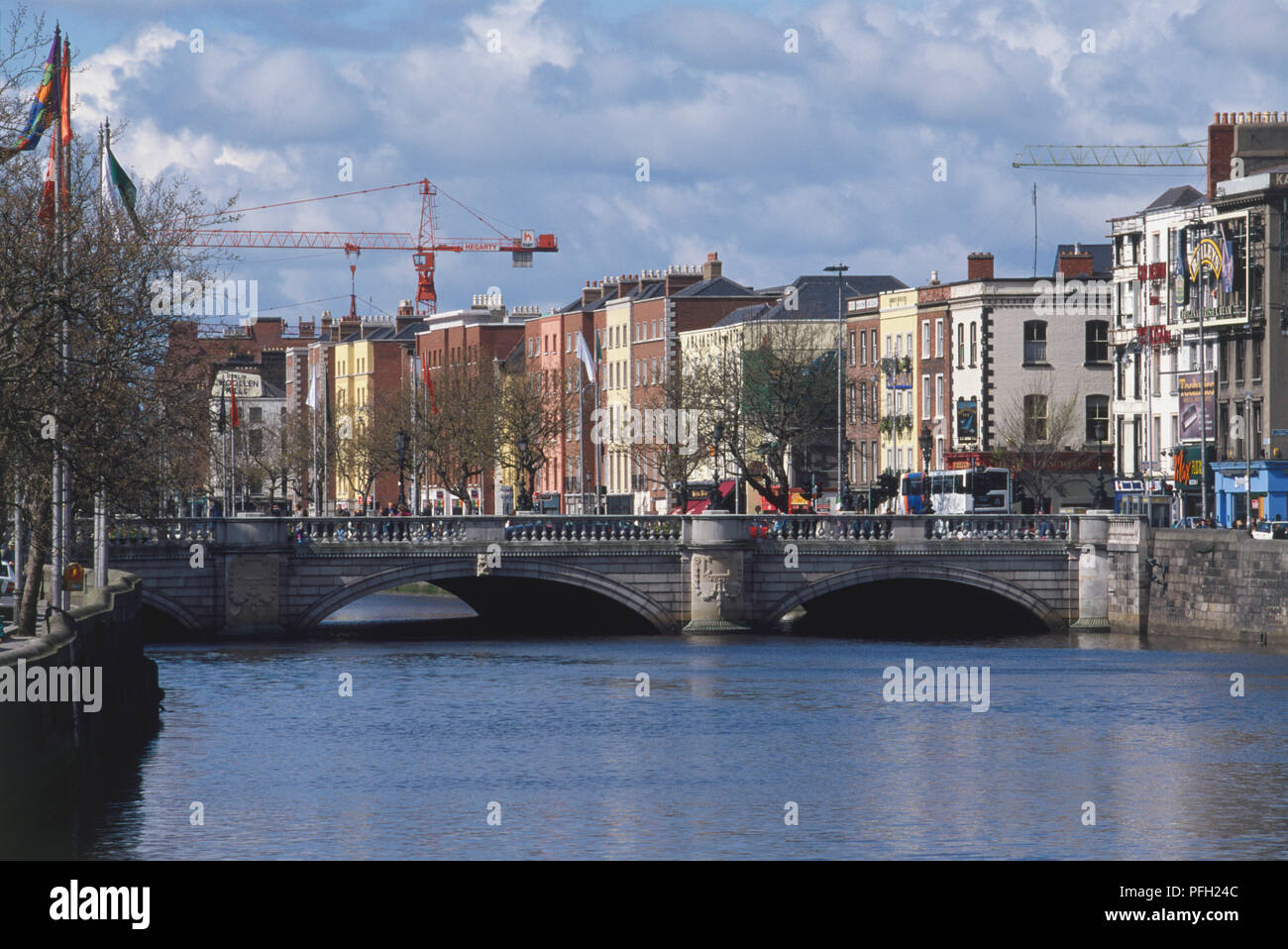 Ireland, Dublin, O'Connell bridge spanning the Liffey, viewed from Butt ...