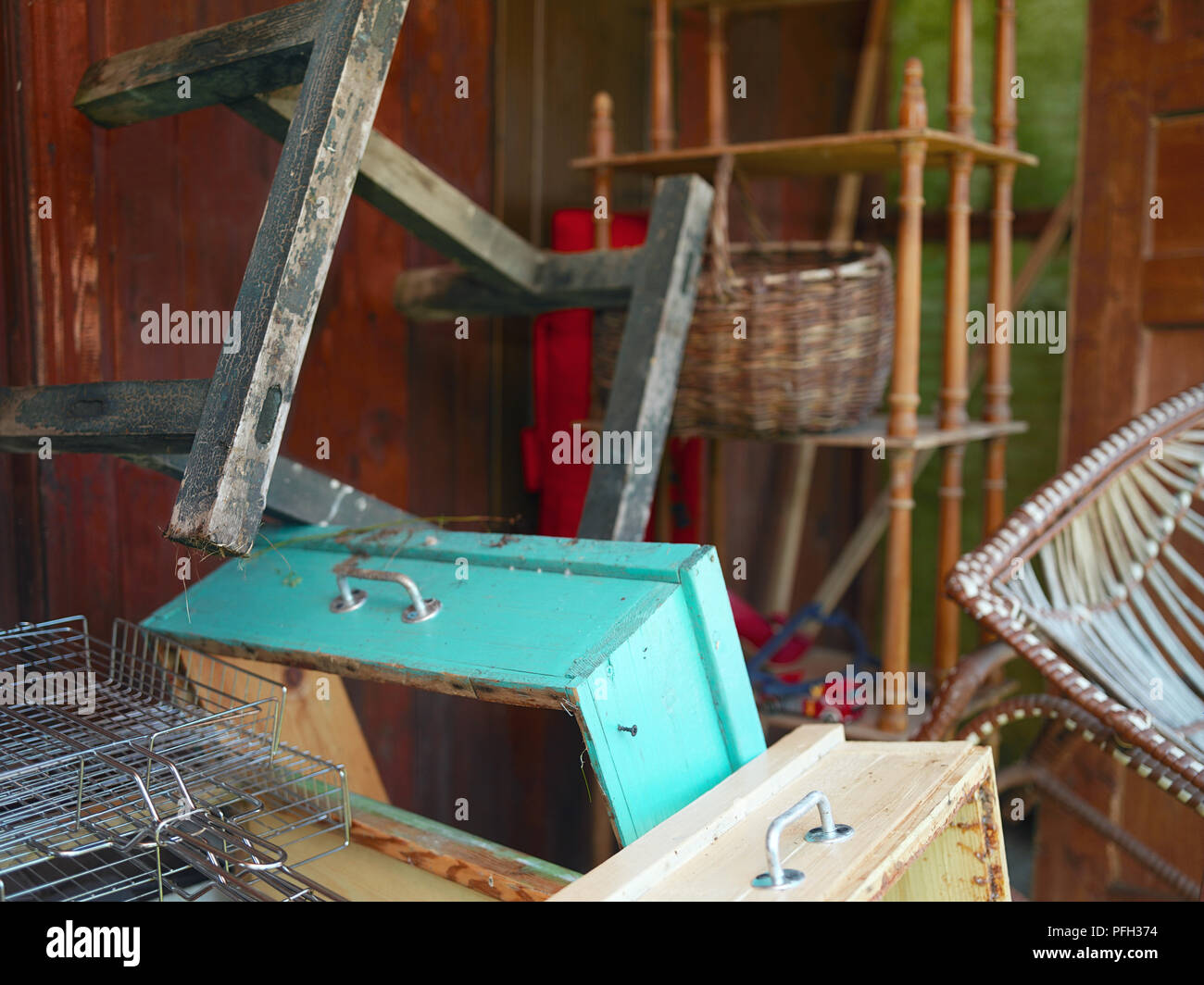 Stack of various home related objects in a room Stock Photo - Alamy