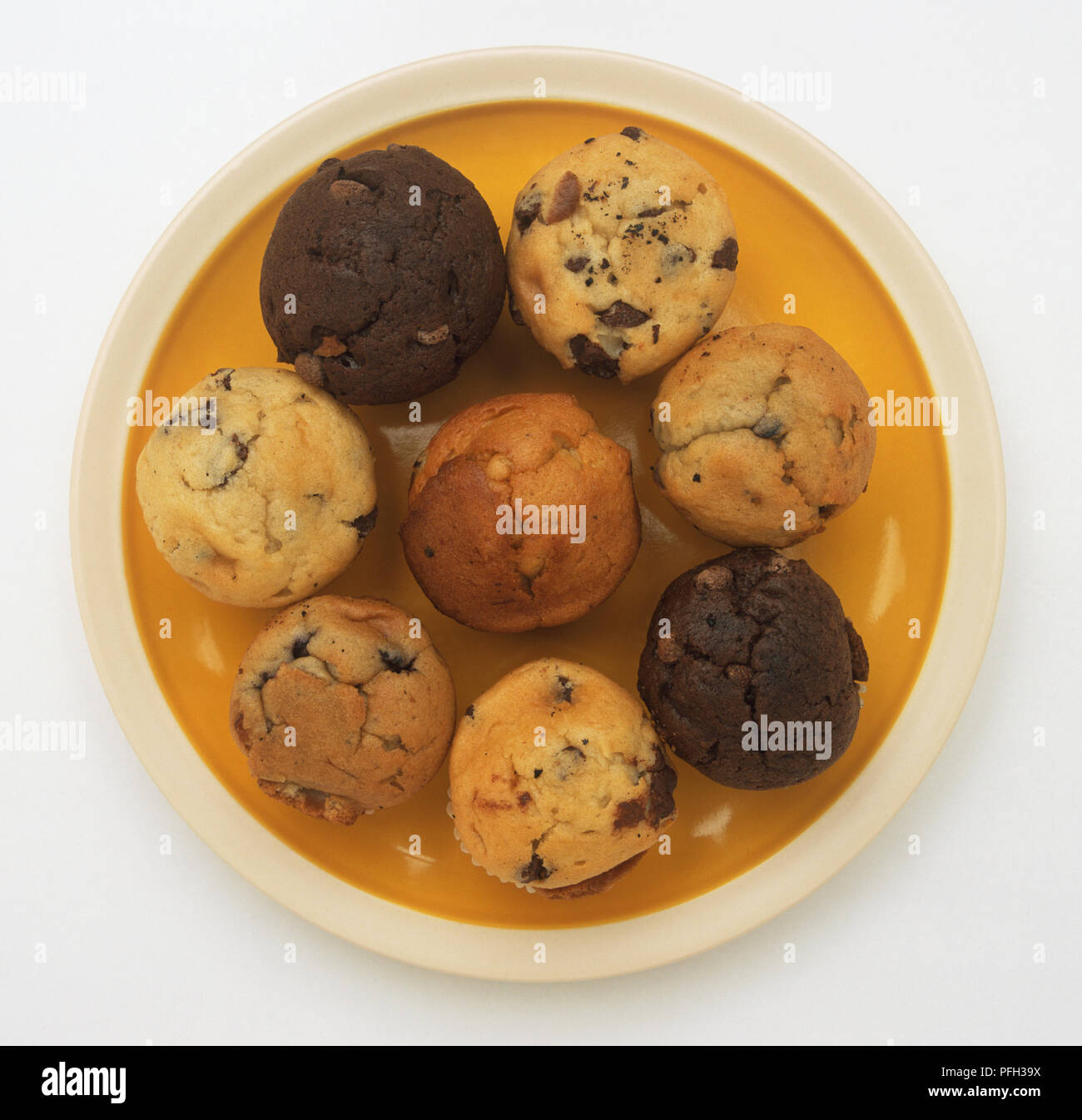 Plate of small chocolate-chip muffins, view from above Stock Photo - Alamy