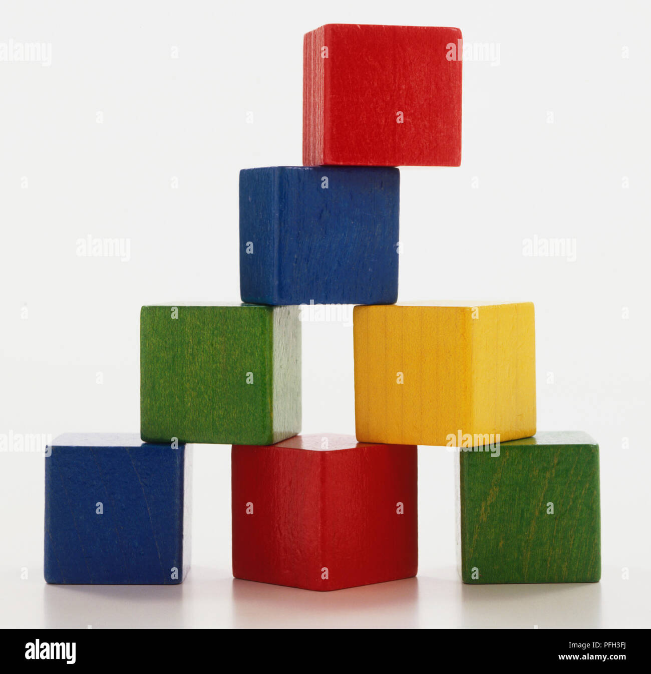 Pyramid of colourful playing blocks Stock Photo - Alamy