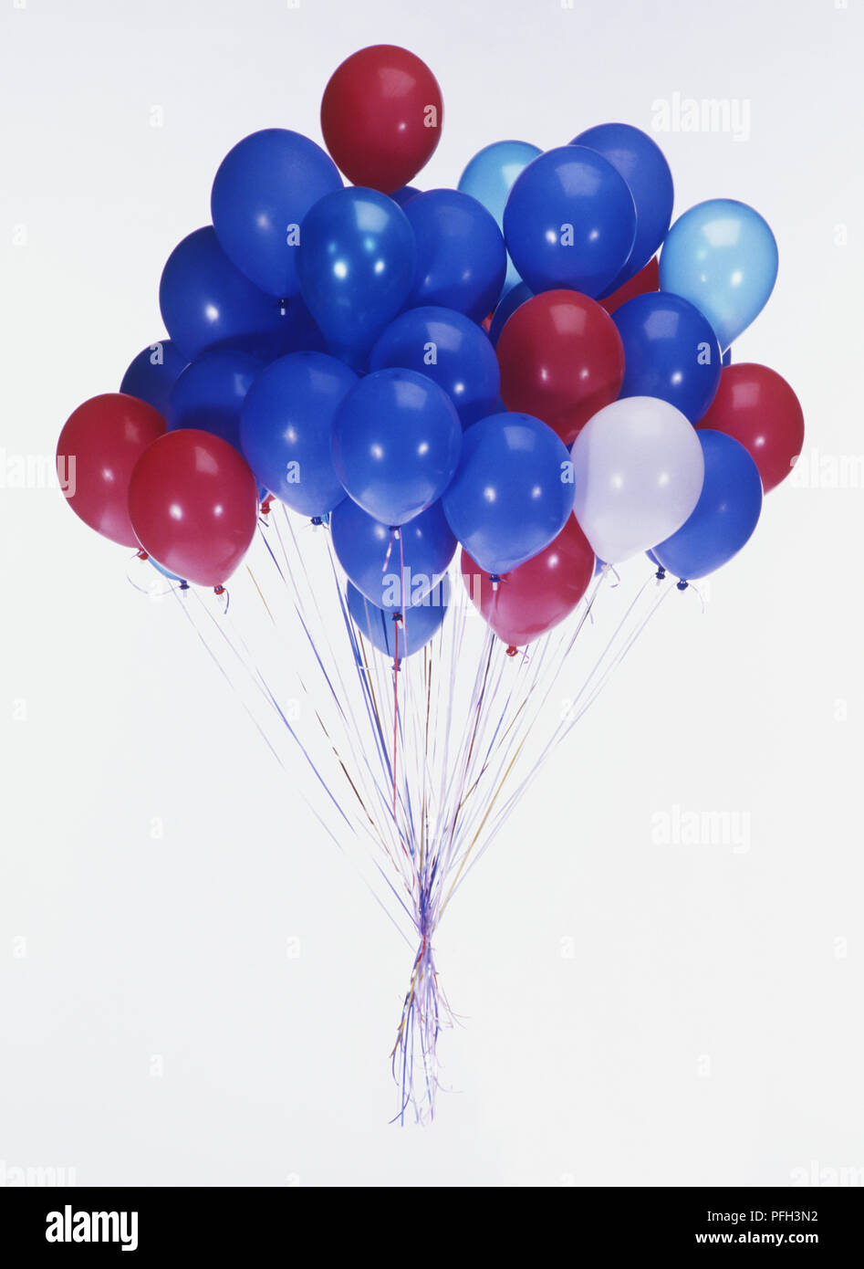 Bunch of blue and red balloons on strings Stock Photo - Alamy