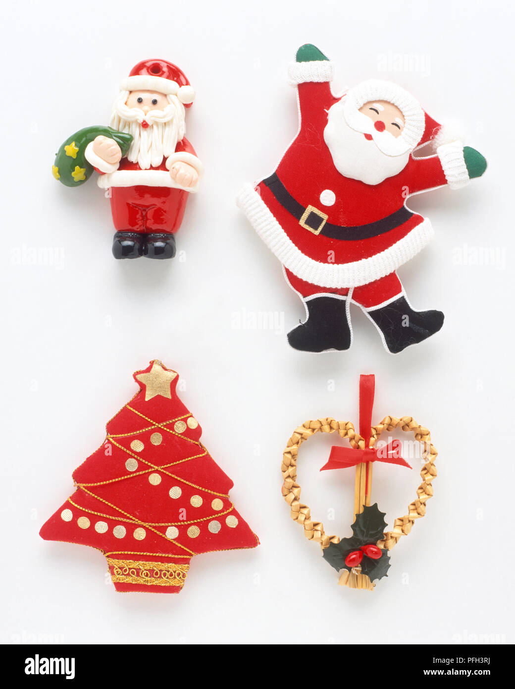 Christmas tree decorations, including Father Christmas, tree and heart ...
