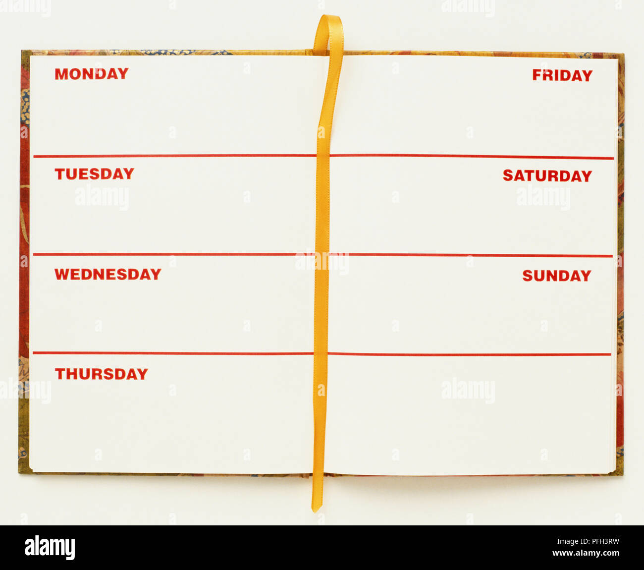 Double-page of weekly timer Stock Photo - Alamy