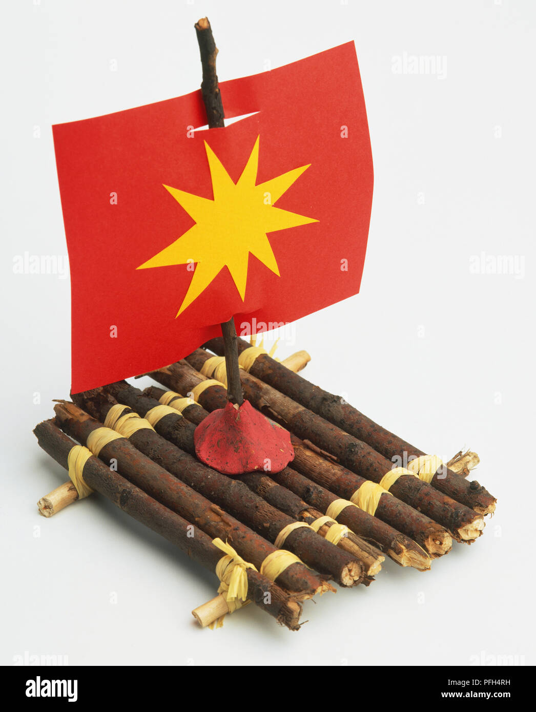 Model raft with red sail Stock Photo - Alamy