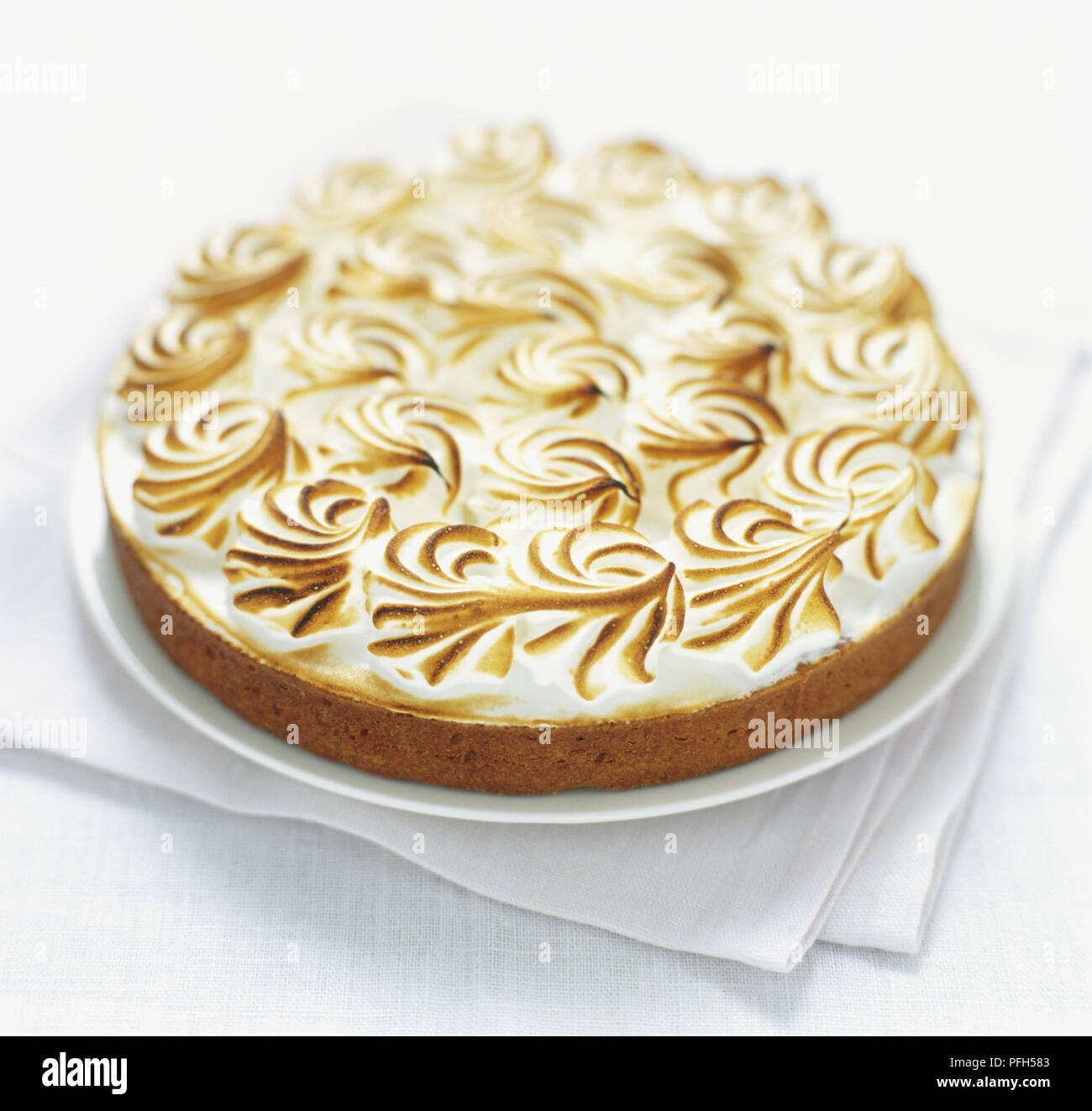 Lemon tart with Italian meringue topping Stock Photo - Alamy