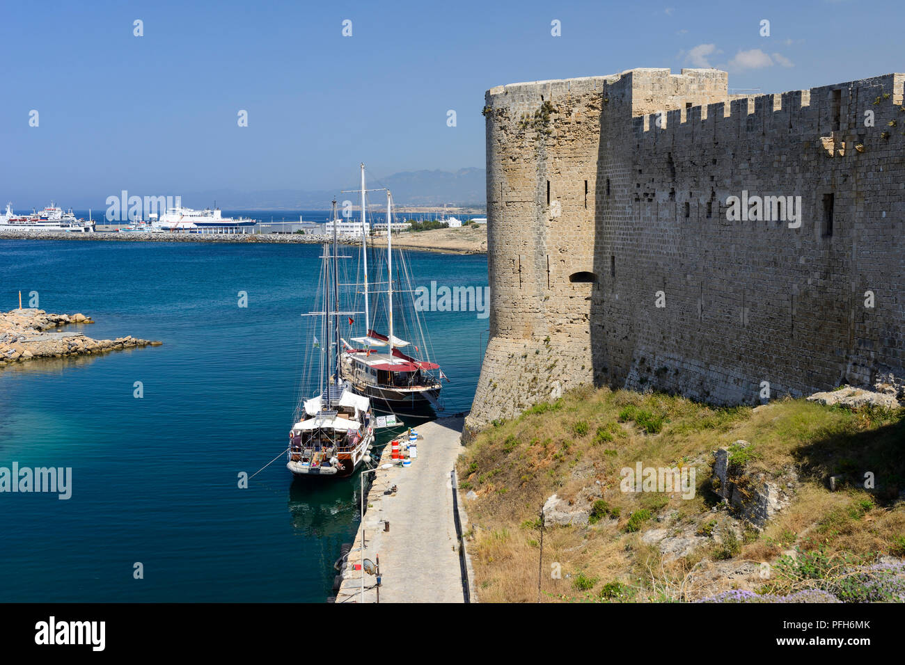 Entrance to Kyrenia harbour and Lusignan Tower of Kyrenia Castle ...
