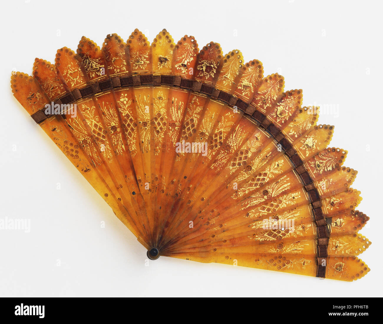 Opened ornate brown fan, front view Stock Photo - Alamy