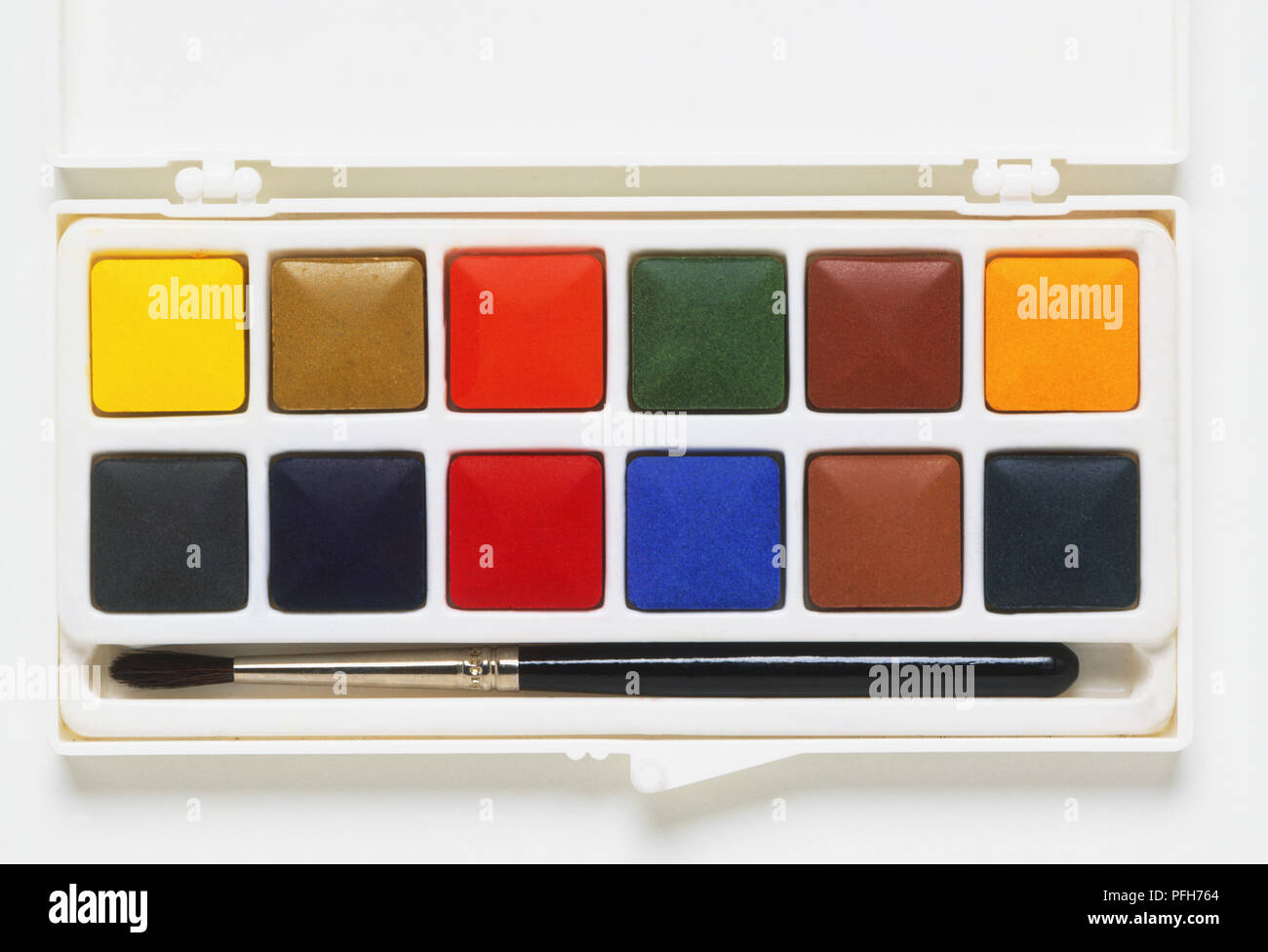 Paint box including a brush Stock Photo - Alamy