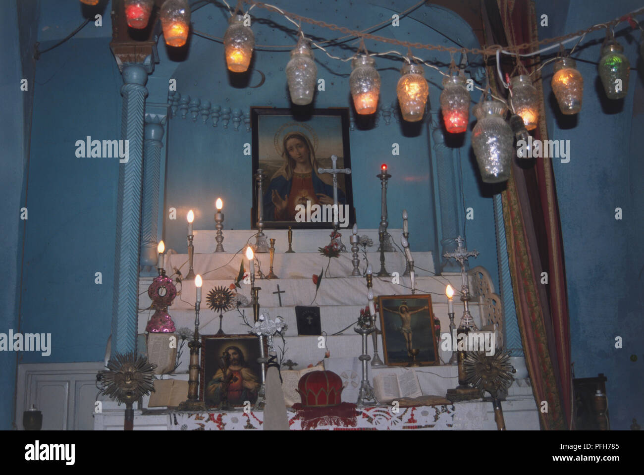 Turkey, altar decorated with candles, crucifixes and pictures, and some ...