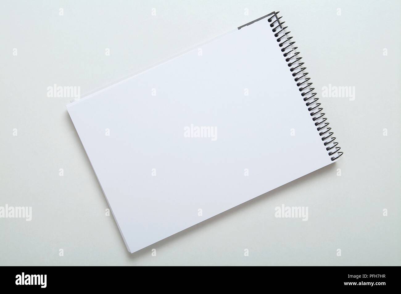 Plain spiral notepad Stock Photo - Alamy