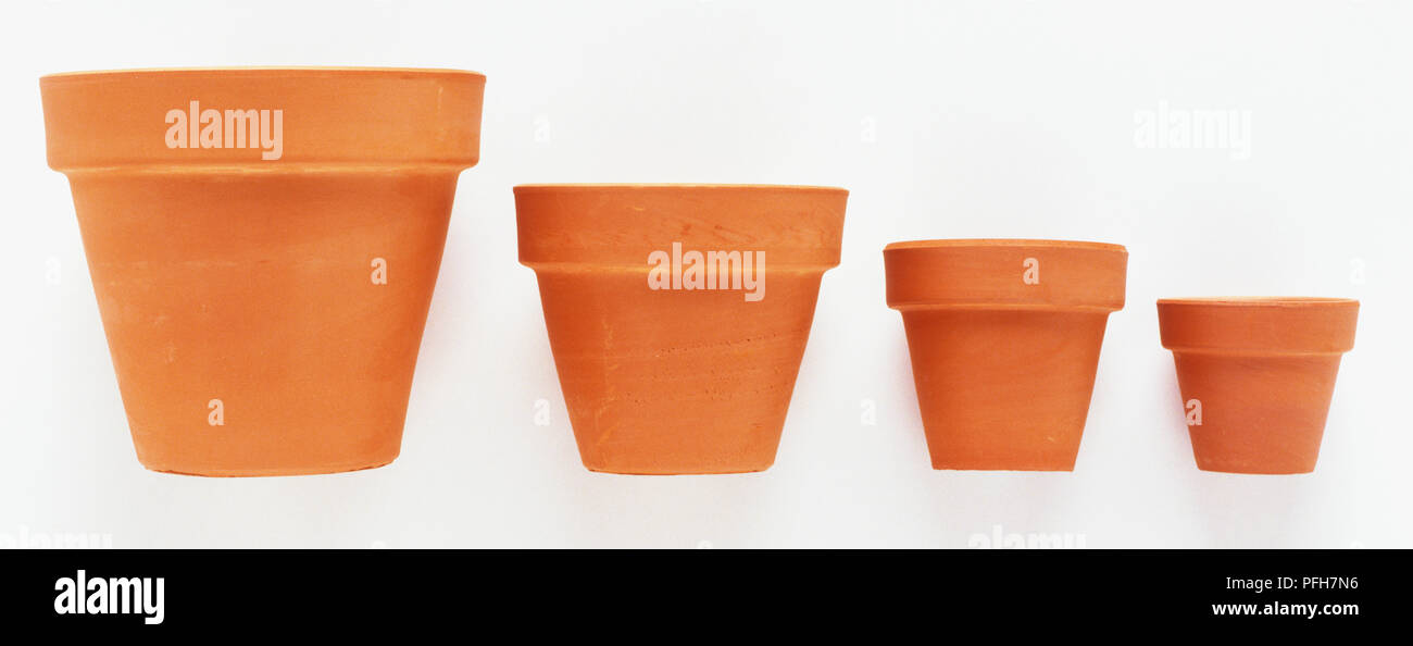 Four different sized plant pots Stock Photo - Alamy