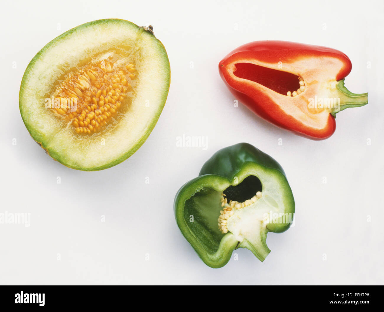 Cantaloupe melon red and green bell peppers, cross-sections Stock Photo ...