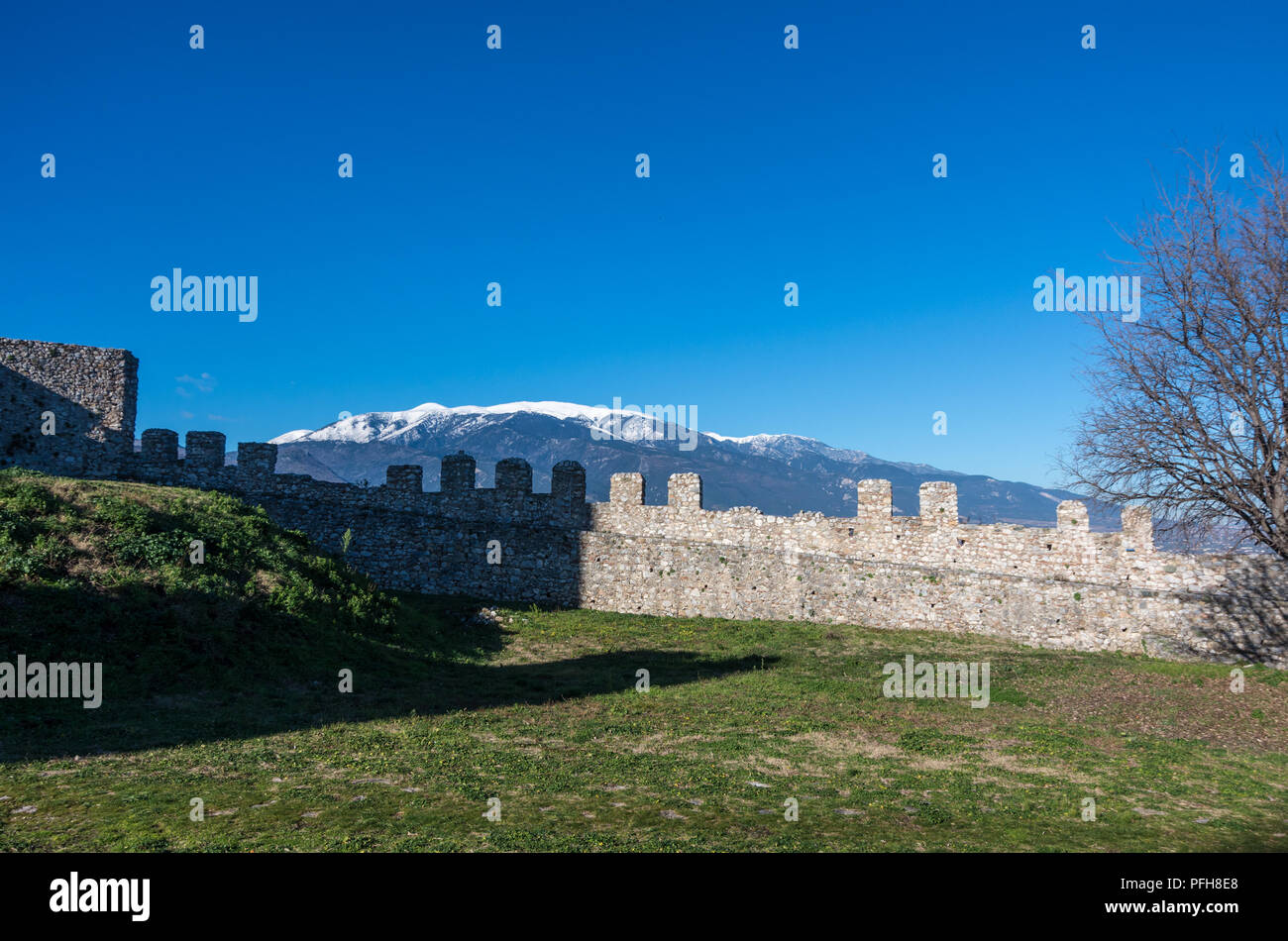Wall of medieval castle of Platamonas with Olympus mountain at ...