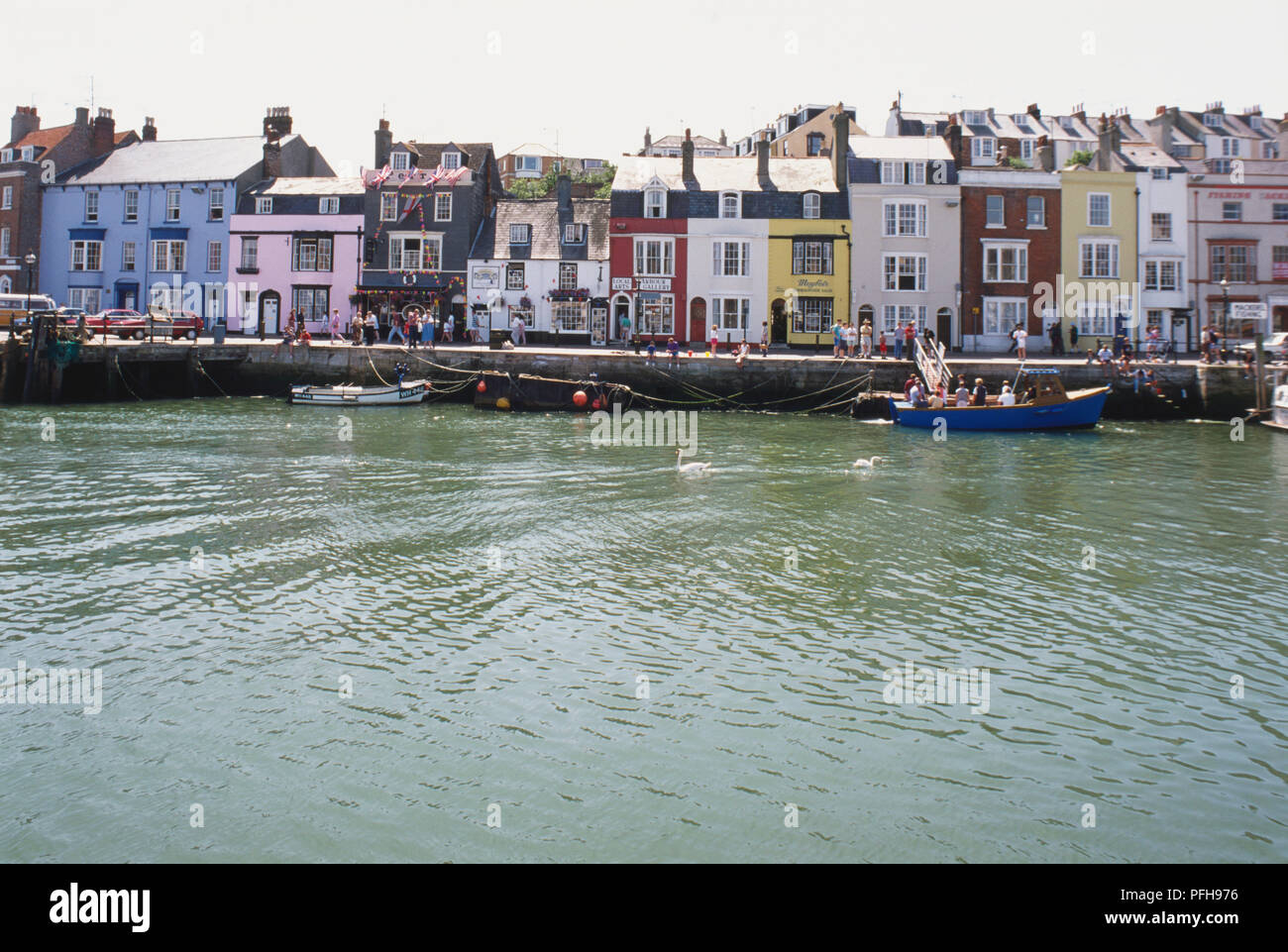 Great Britain, England, Dorset, Weymouth, a row of brightly coloured ...