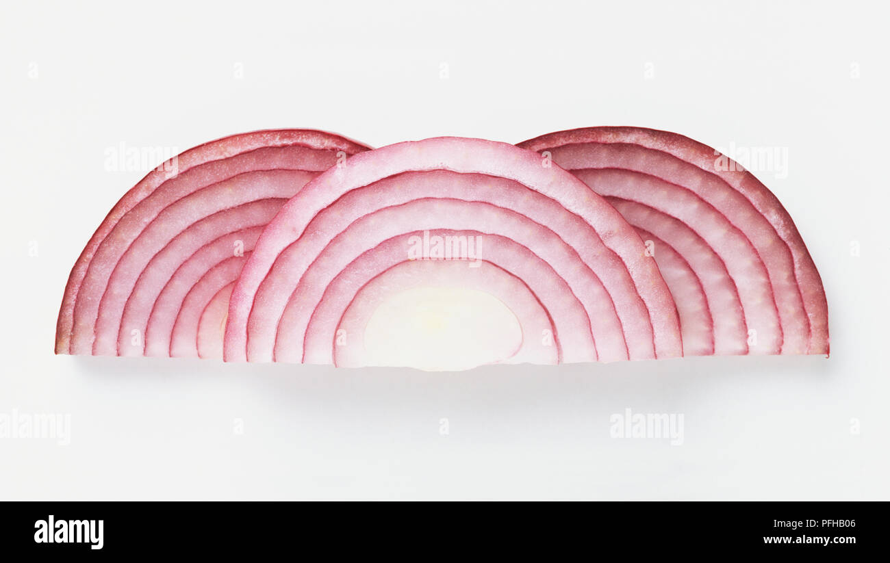 Three slices of red onion, close up Stock Photo - Alamy