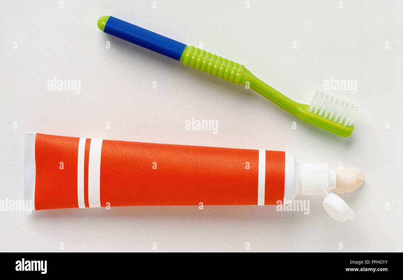 Toothpaste tube, toothpaste and toothbrush Stock Photo - Alamy