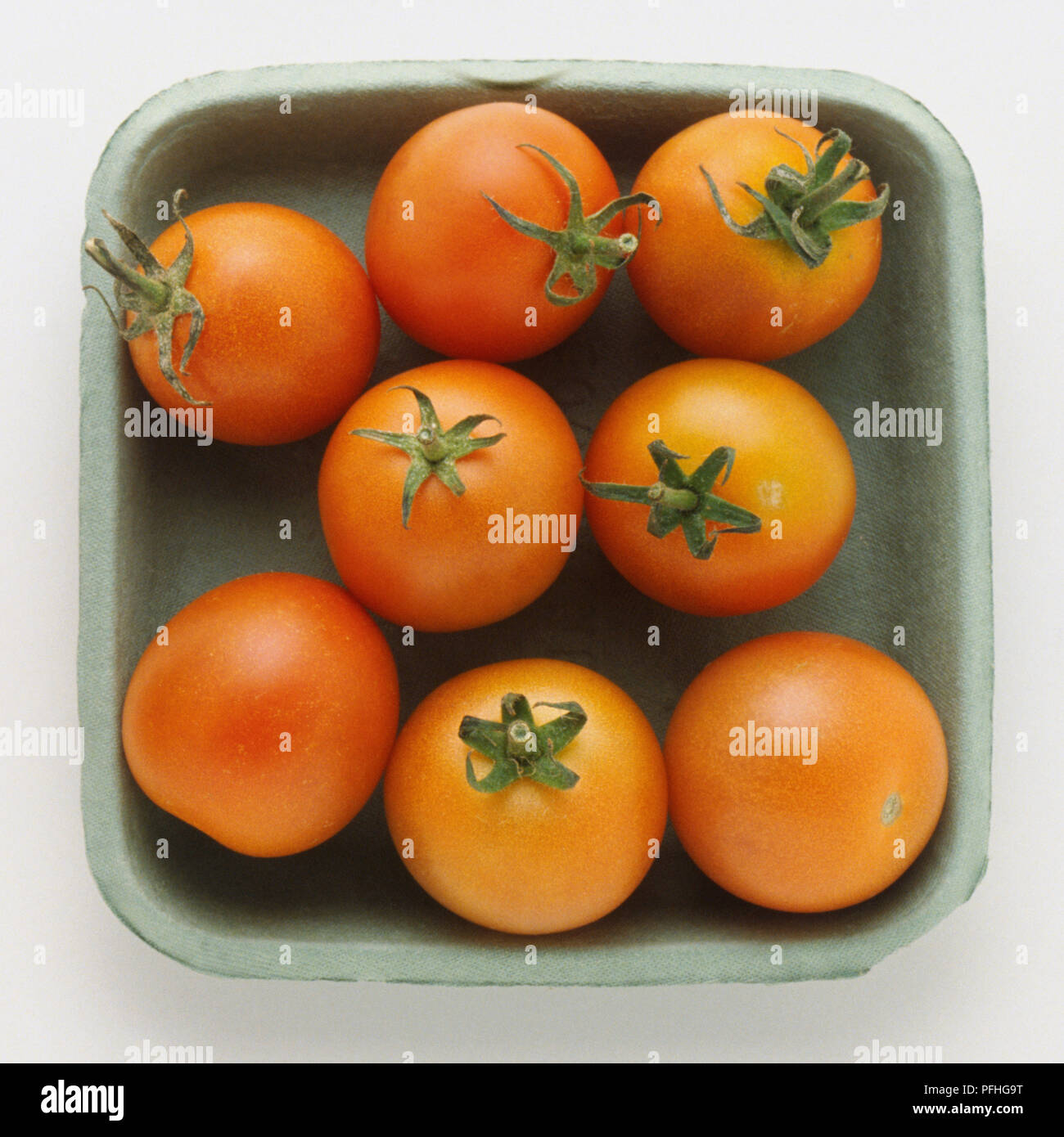 Packaged group of cherry tomatoes Stock Photo - Alamy