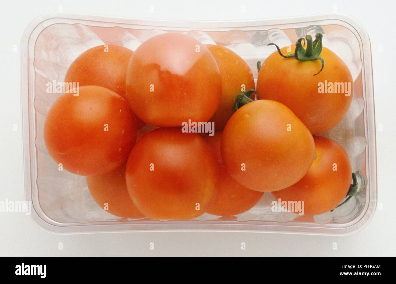 Small packaged tomatoes Stock Photo - Alamy