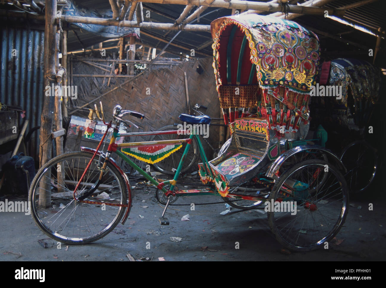 A bicycle rickshaw, side view Stock Photo - Alamy