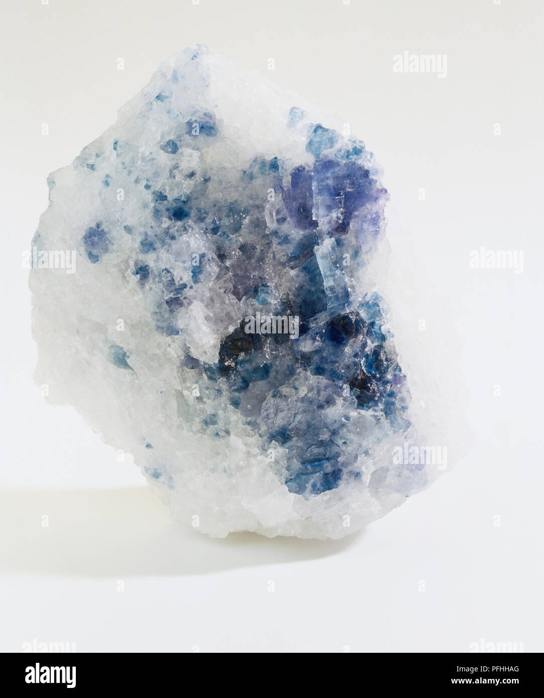 Massive specimen of rock salt with coarse blue and white crystals ...