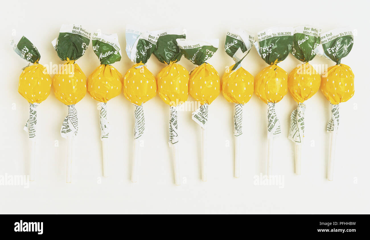 Row of wrapped lollipops Stock Photo - Alamy