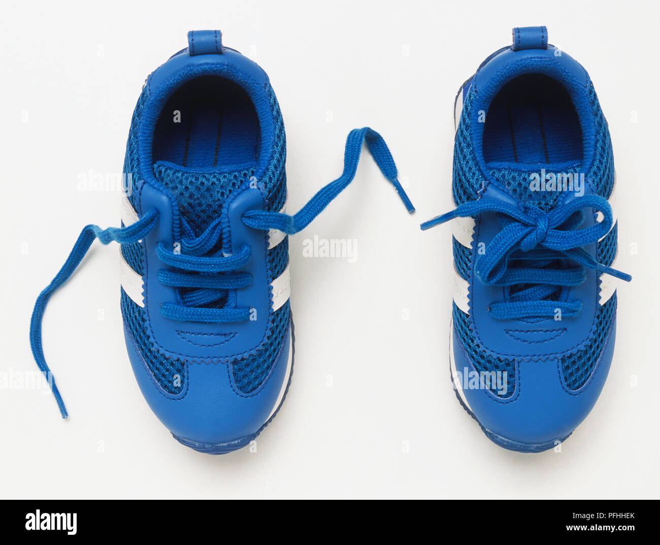 Blue training shoes, view from above Stock Photo - Alamy