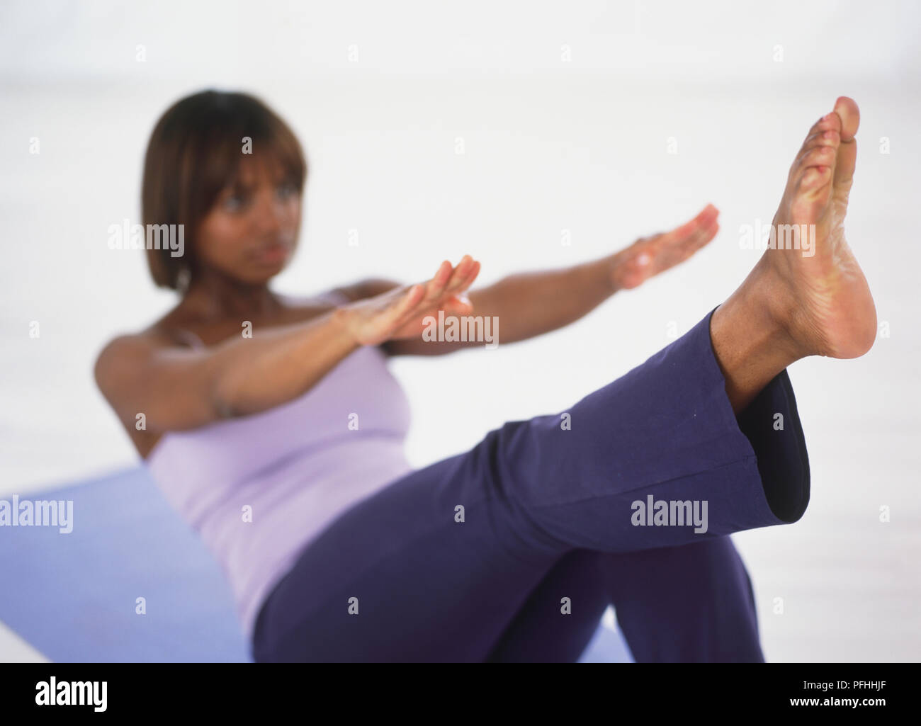 One leg straight other bent hi-res stock photography and images - Alamy