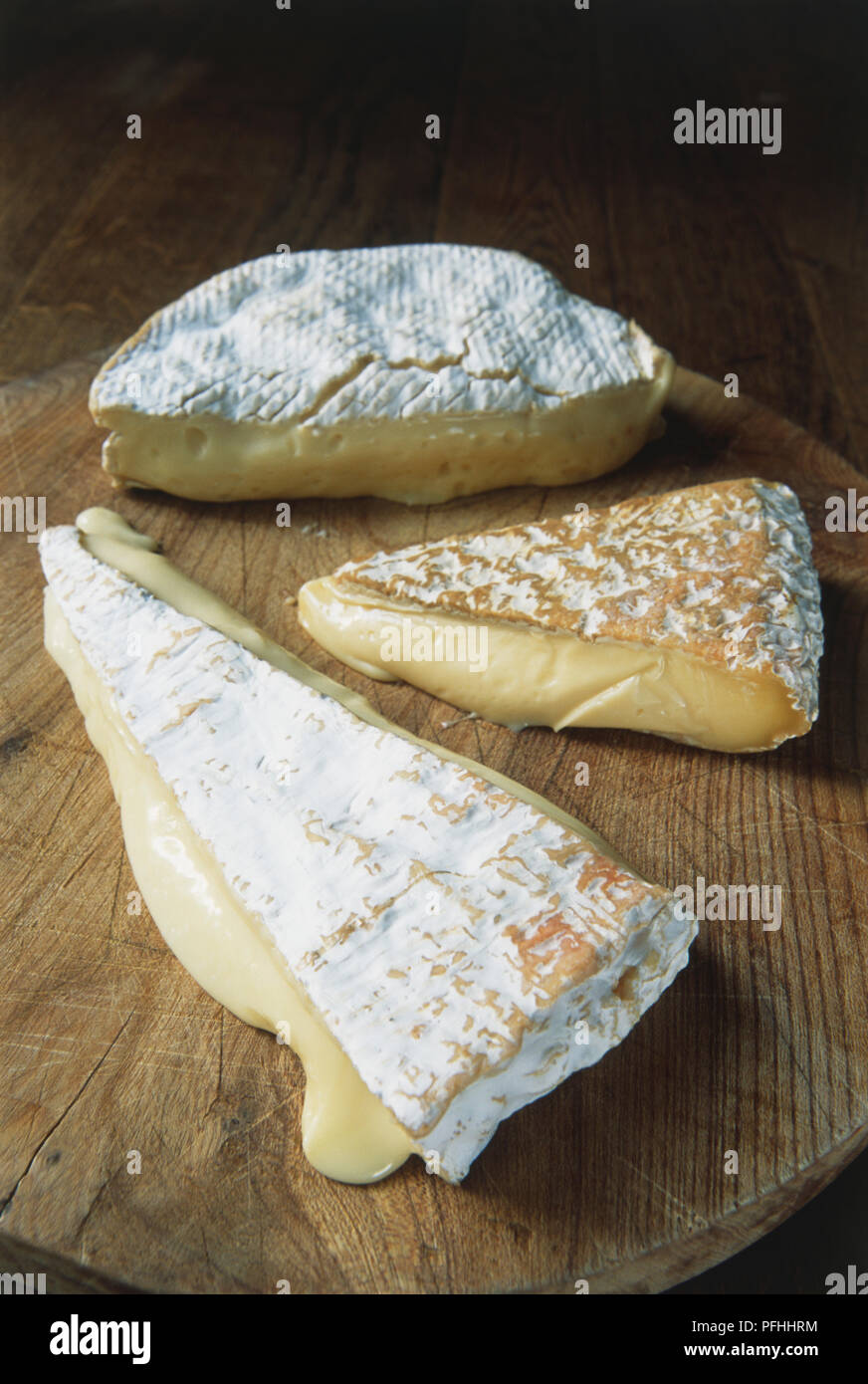 Three different types of ripe French Brie Stock Photo - Alamy