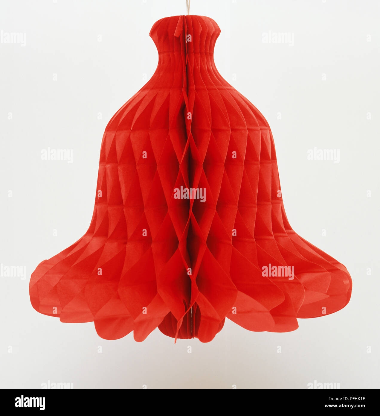 Red bell-shaped paper decoration, close up Stock Photo - Alamy
