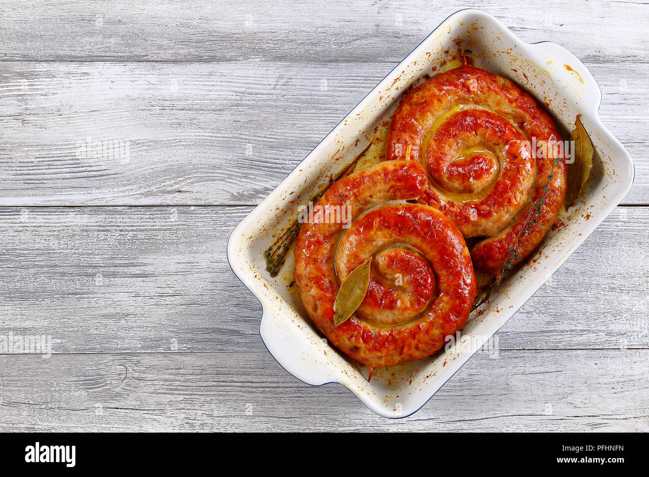 delicious Thuringian Bratwurst - round fried sausages on wooden skewers ...