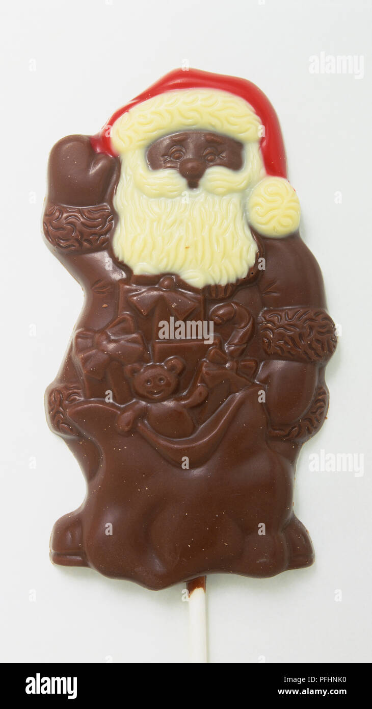 Father Christmas chocolate lolly Stock Photo - Alamy