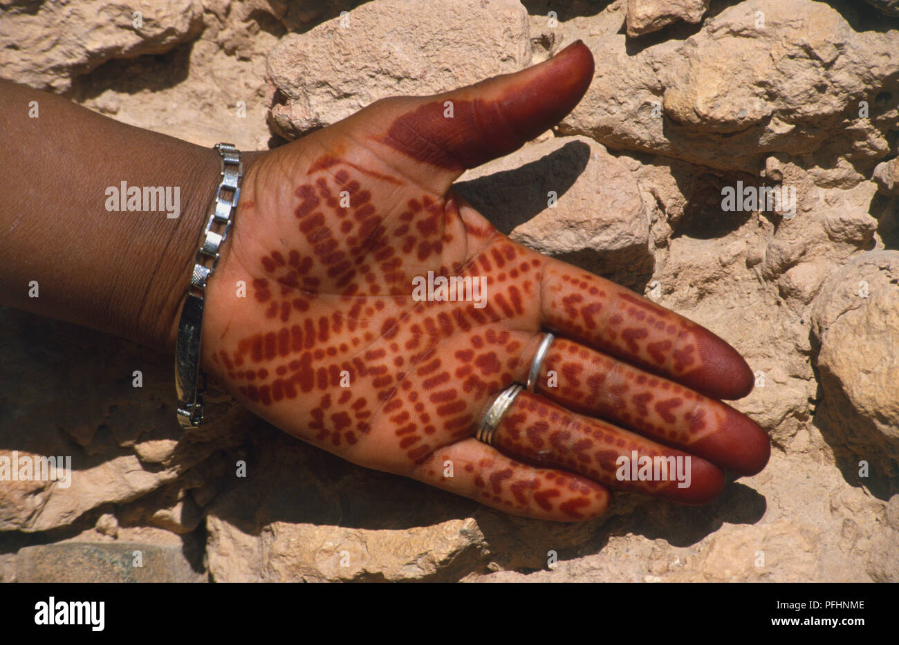 Morocco, hand of Berber woman decorated with henna pattern Stock Photo ...