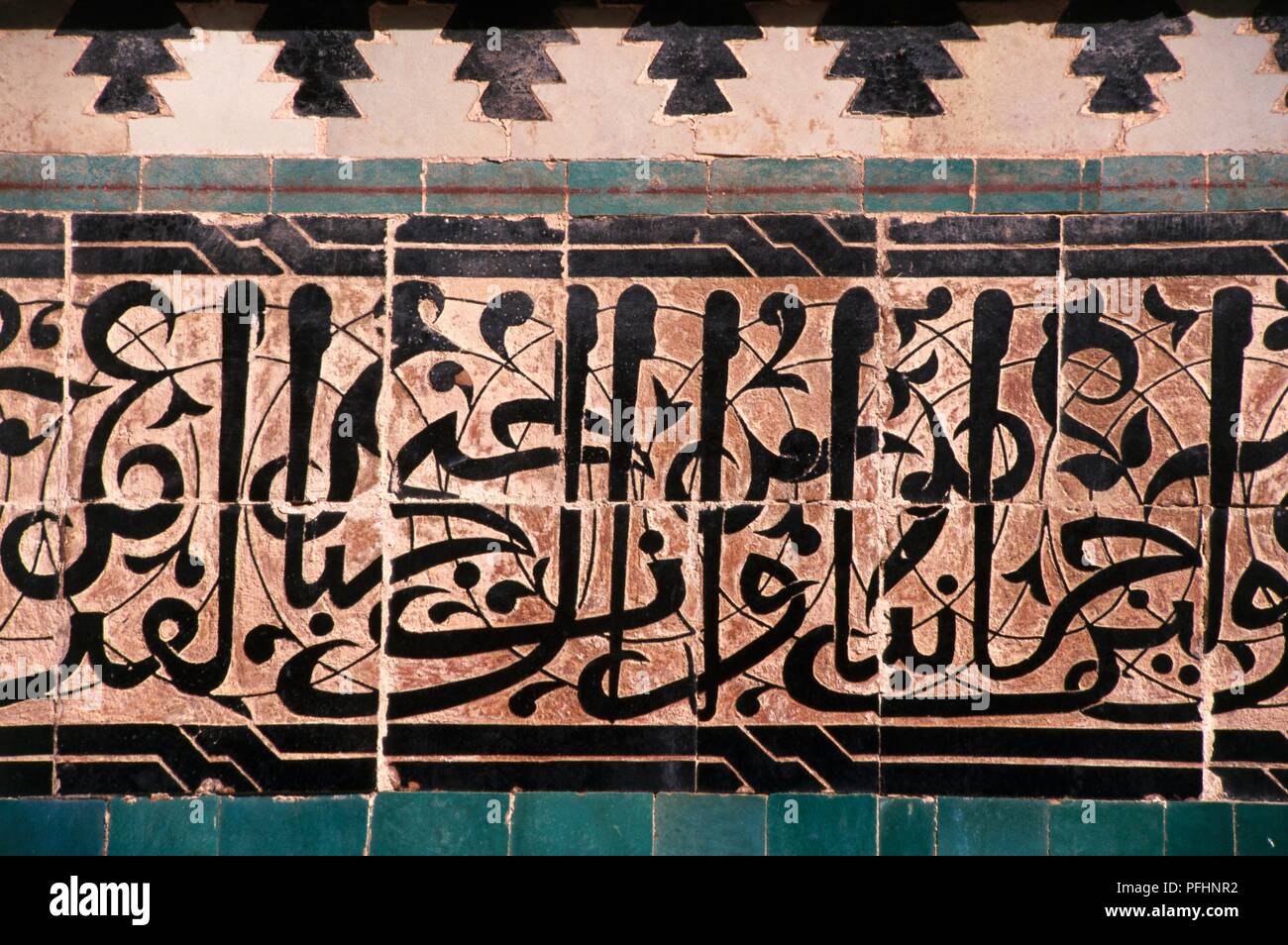 Morocco, Fes, cursive script in form of carved zellij tilework from Bou ...